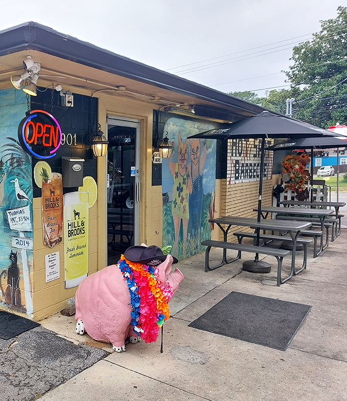 The pink pig greeter wears a lei&mdash;a whimsical welcome to a serious flavor party happening inside.