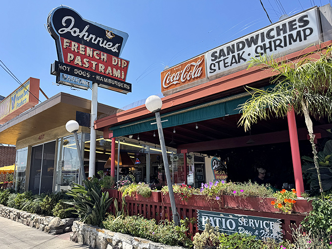 Johnnie's vintage sign has been guiding hungry souls to pastrami paradise since before Instagram could make food famous.