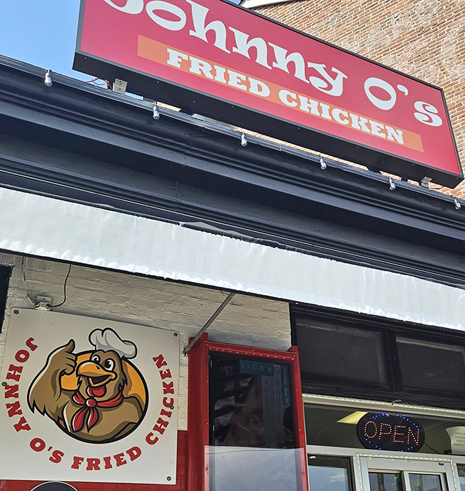 Johnny O's vibrant red building stands out like a tasty landmark &ndash; the chicken equivalent of a lighthouse guiding hungry sailors home.