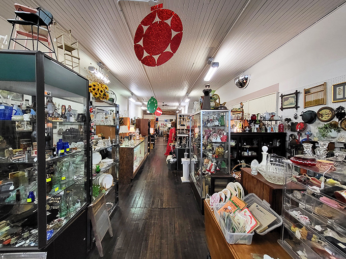 Inside this organized paradise, display cases showcase delicate treasures while larger pieces command attention throughout.