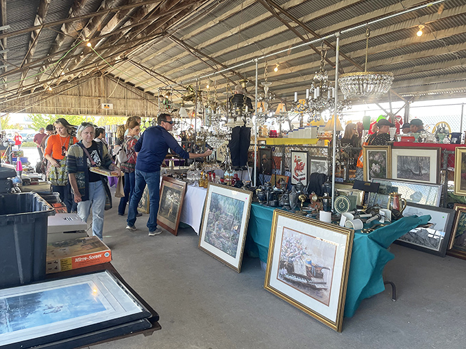 Vintage glassware and antique treasures sparkle under pavilion lights like jewels in a pirate's chest.