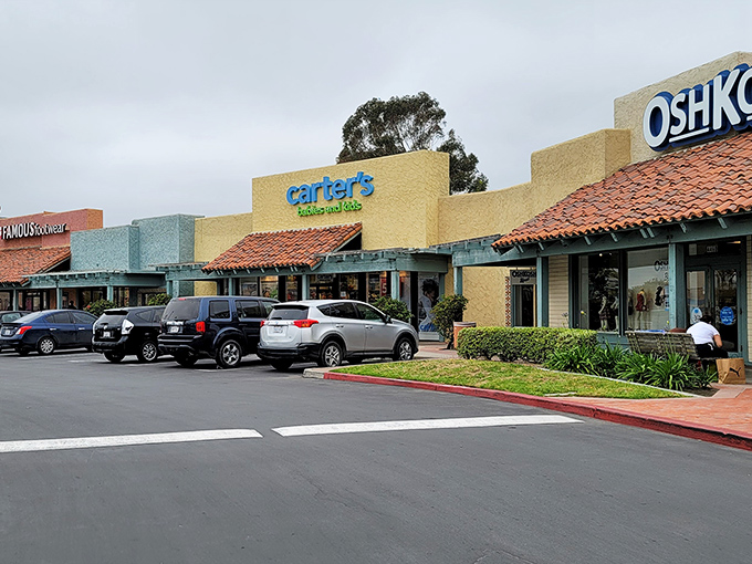 Colorful architecture celebrates the vibrant border culture where international shopping meets California outlet charm perfectly.