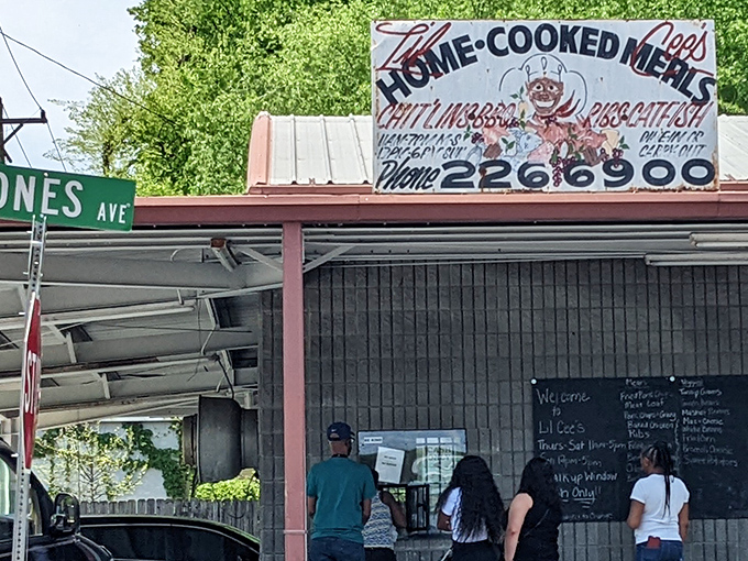 Lil Cee's hand-painted sign promises home cooking that Instagram filters can't improve. Soul food that actually feeds your soul!