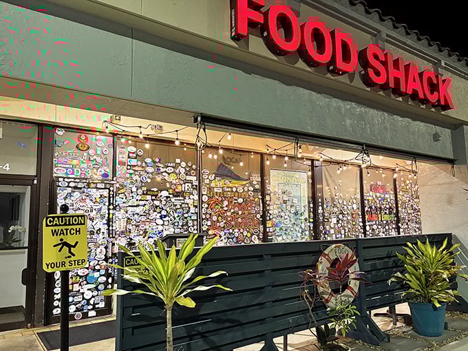 The Food Shack's windows are plastered with stickers like a well-traveled suitcase. Each one represents someone who fell in love.