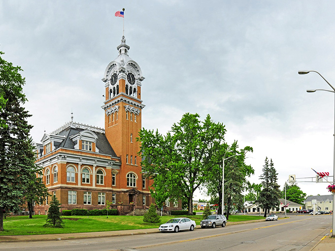 That magnificent courthouse clock tower stands sentinel over tree-lined streets, marking time at a pace that actually makes sense.