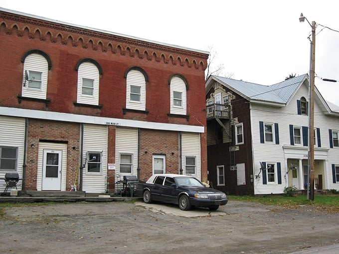 Simple brick and wood buildings in Milford echo the town&rsquo;s quiet history, where everyday life still unfolds against a backdrop of the past.