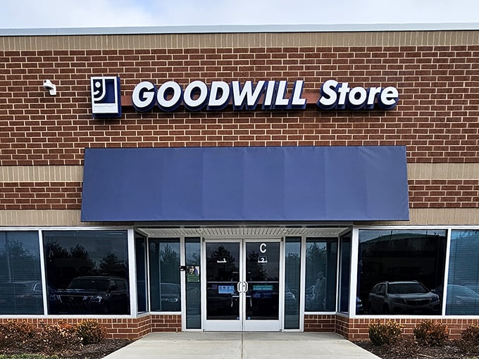 Goodwill's classic blue signage promises both bargains and good karma. Shopping that makes your wallet and conscience feel equally satisfied!