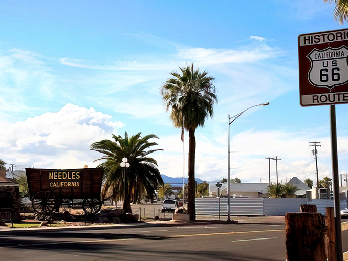 Needles welcomes visitors with classic Americana charm and palm trees swaying in desert breezes.