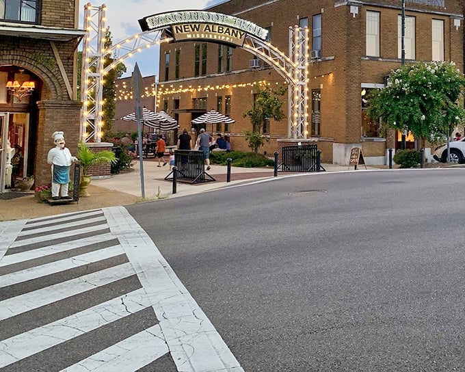 New Albany's twinkling archway welcomes visitors like a Southern fairy tale come to life at twilight.
