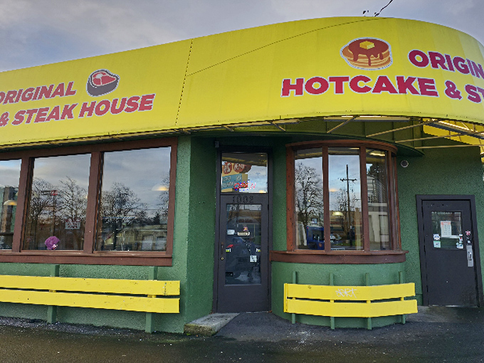 Bright yellow and green screams "happiness served here" – like sunshine in building form, honestly.