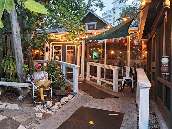String lights and outdoor dining create the perfect backdrop for Florida's most relaxed seafood experience.