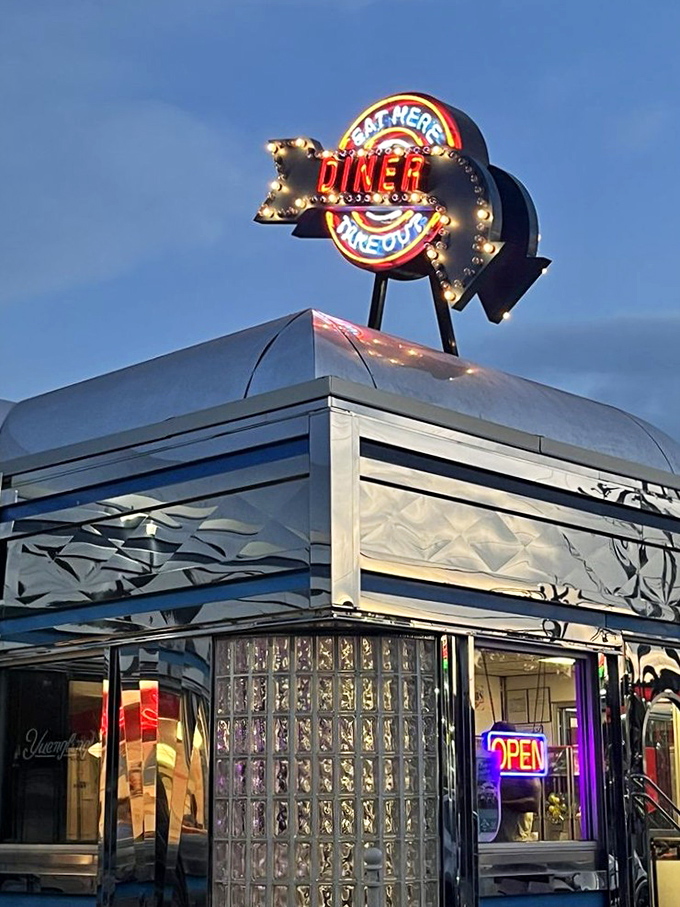 Pine Grove Diner's neon arrow points straight to happiness, one perfectly cooked meal at a time.