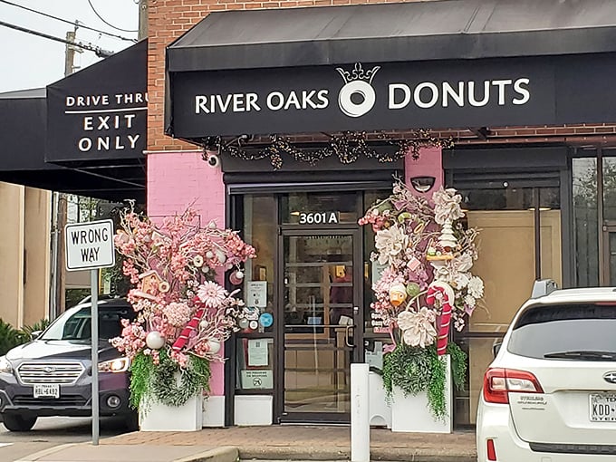 Pink accents and black elegance create the perfect backdrop for Houston's most Instagram-worthy donut destination.