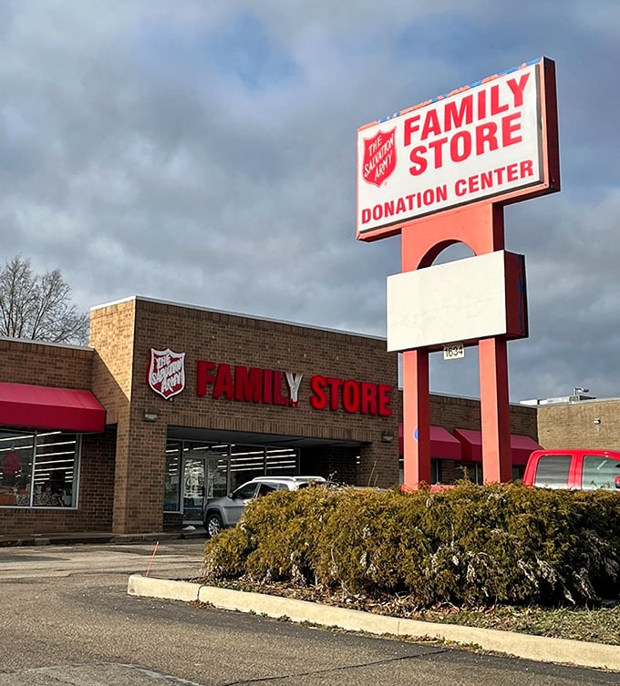 The Salvation Army's red and white beacon calls to bargain hunters like a lighthouse guides ships home.