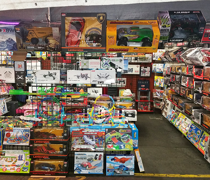 Colorful toys line the shelves at Santa Fe Springs Swap Meet. Childhood nostalgia in plastic form!