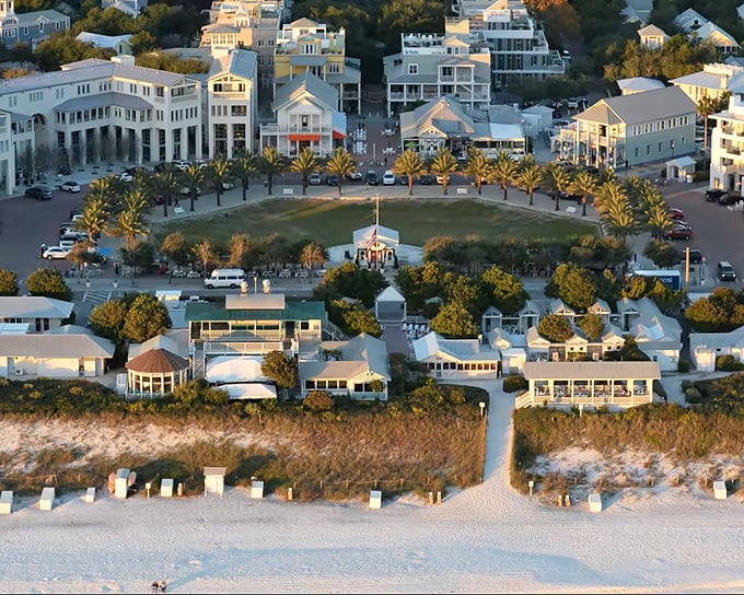 The heart of Seaside welcomes visitors with palm-lined streets and pastel buildings. No wonder Hollywood chose this as their perfect small town.