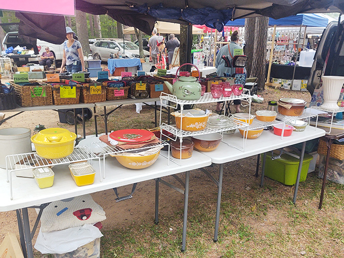 Colorful Pyrex bowls line up like rainbow soldiers, ready to brighten kitchens across the Northwoods.