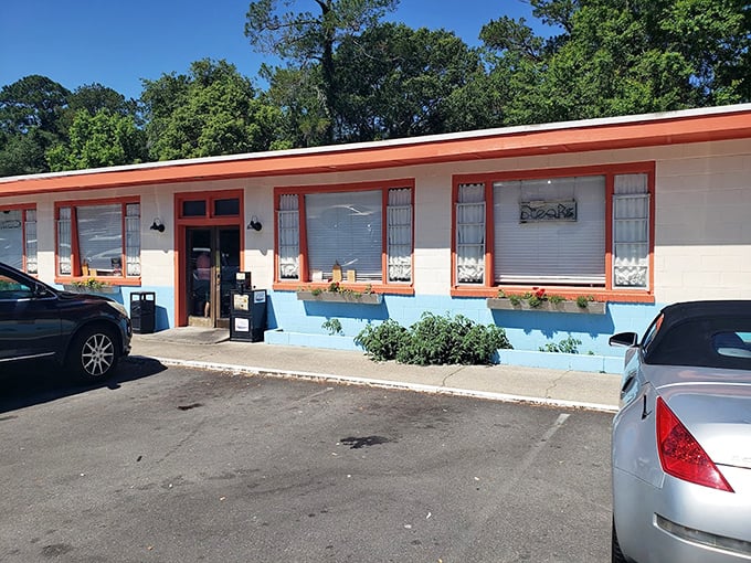 White walls and red accents keep things simple while the food does all the talking.
