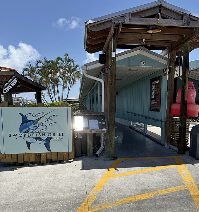 Swordfish Grill's entrance is like the gateway to Old Florida&mdash;weathered wood, fishing village charm, and the promise of something delicious waiting inside.