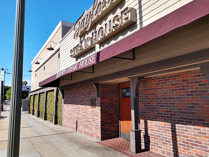 Taylor's classic brick exterior and vintage sign whisper of steakhouse glory days. Some traditions are worth preserving!