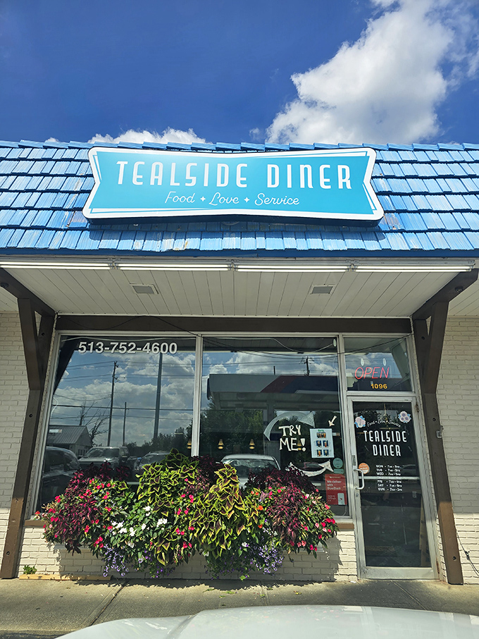 That bright blue roof is like a beacon for hungry travelers &ndash; "Pull over here for breakfast bliss!"