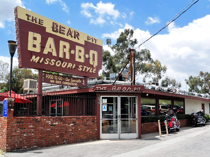 That vintage Bear Pit sign has been calling hungry folks to Missouri-style barbecue for generations now.