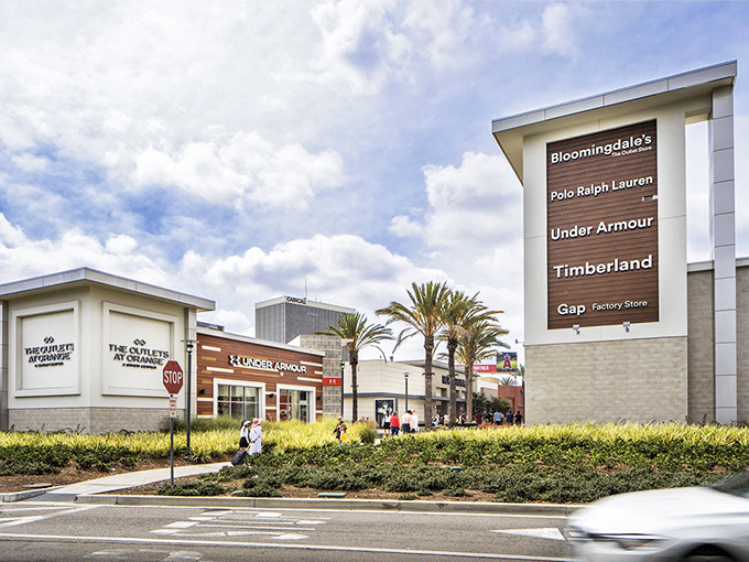 The Outlets at Orange tower stands like a friendly lighthouse guiding shoppers to safe harbor. Hurley by day, bargains by night!