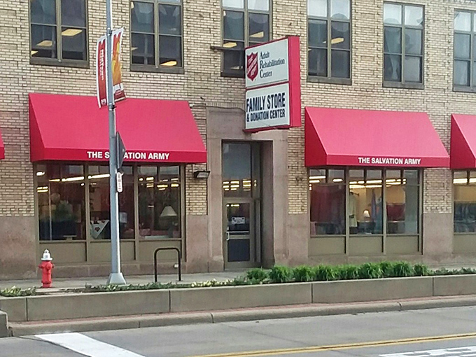 The Salvation Army's vintage brick building stands as a Cleveland landmark, its red awnings like welcome flags for bargain seekers.