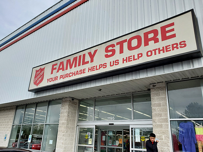 The Salvation Army's bold red, white, and blue signage stands out like a beacon. America's favorite thrift chain promises patriotic savings!