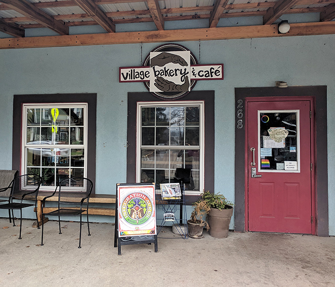 That welcoming covered porch practically begs you to slow down and savor life's sweetest moments.
