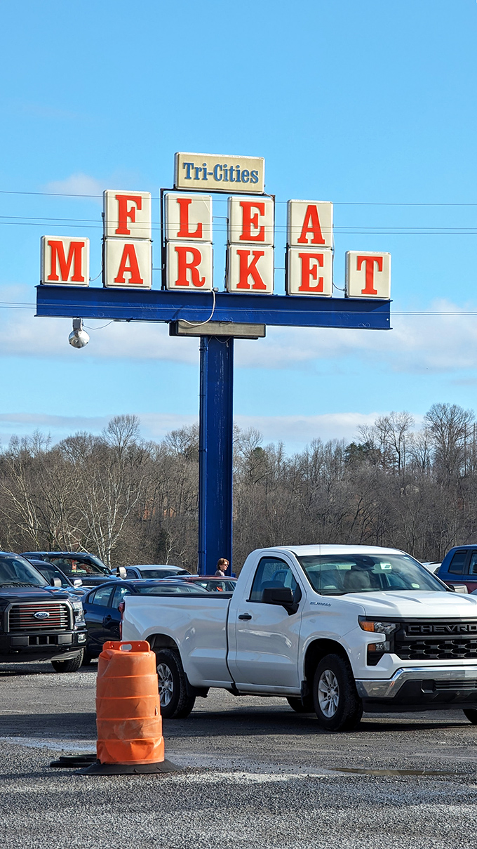 Mountain views and marketplace vibes - the Tri-Cities sign promises big things for bargain hunters.