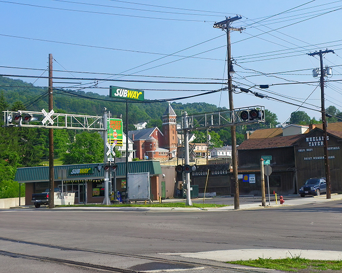 Morning mist hugs the mountains around Westernport like nature's own comfort blanket. Living here costs less than your monthly coffee budget elsewhere!
