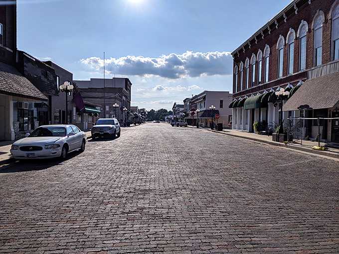 A brick-paved street stretches into the horizon, proving sometimes simplicity serves the richest flavor.
