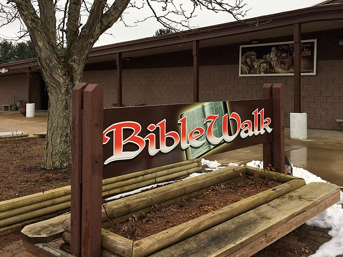 A light layer of snow surrounds the sign for Ohio’s surprising wax museum, where lifelike scenes bring biblical stories to life.
