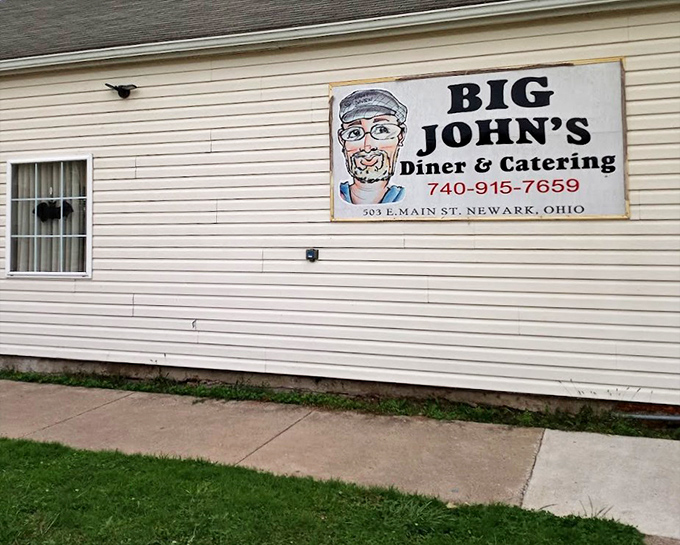 The hand-painted sign says it all&mdash;Big John's is about personality, not pretension. That motorcycle knows where the good food is!