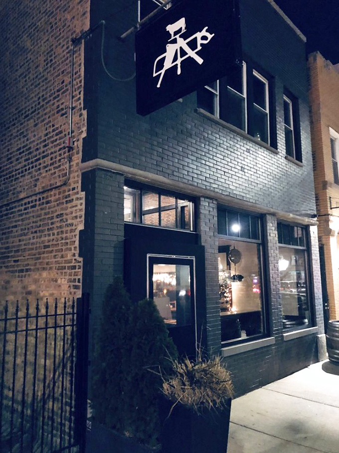 Evening ambiance that transforms a simple brick building into a carnivore's glowing beacon of hope. 