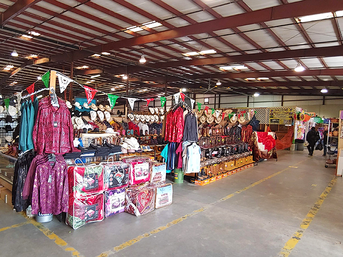 Wide aisles and bright lighting make browsing comfortable while vendors showcase their carefully arranged treasures.