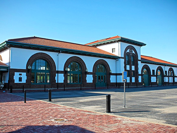 The arched windows and terra cotta roof of Brownwood's historic station create a postcard-perfect scene that belongs on a Texas tourism brochure.