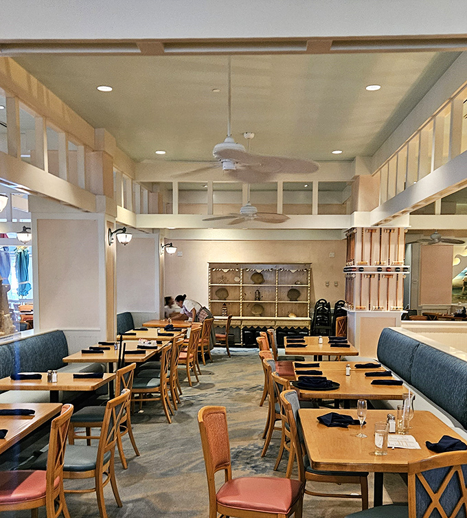 Nautical touches and warm lighting create the perfect setting for character breakfasts and seafood feasts.