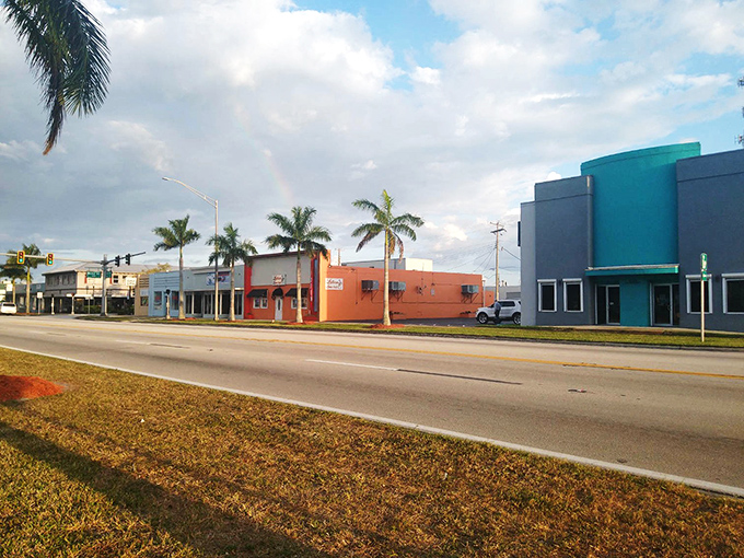 Rainbow over Clewiston's colorful storefronts&mdash;Mother Nature's way of saying, "You think YOUR paint job is impressive? Hold my sunbeam."