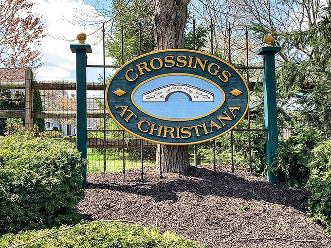 The welcoming entrance sign to Crossings at Christiana stands proudly among manicured greenery. First impressions that say "you've arrived!"