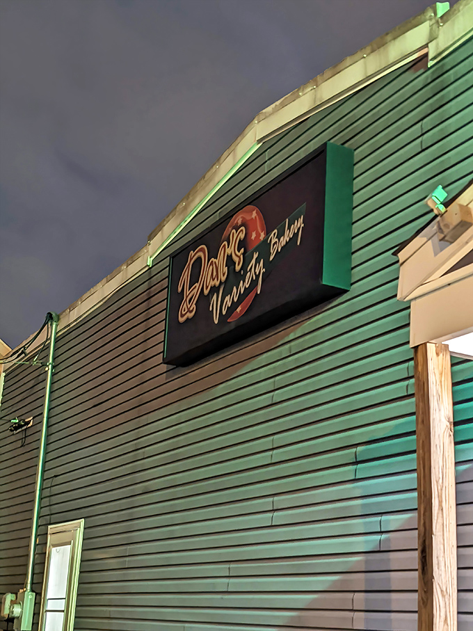 The neon "Open" sign might as well say "Get in here for donuts that will make your day!"