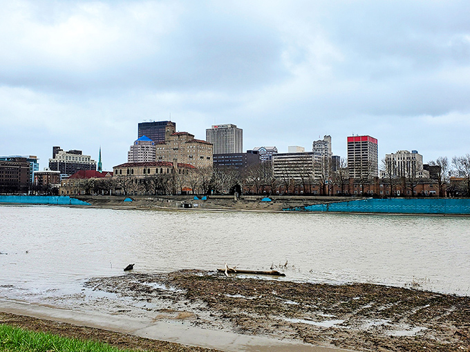 The Great Miami River reflects Dayton's skyline like nature's own mirror, doubling the city's quiet charm.