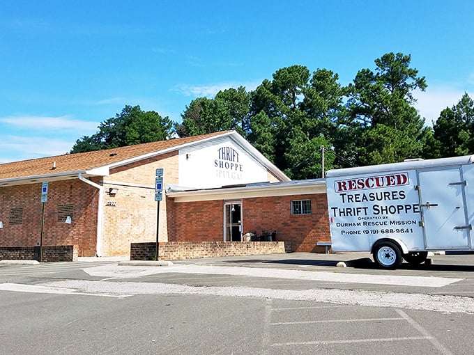 The "Rescued Treasures" truck parked outside hints at the fresh inventory constantly flowing into this thrifting haven.