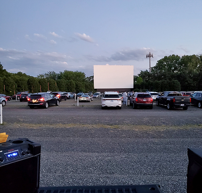 Cars line up like eager audience members waiting for the curtain to rise tonight.