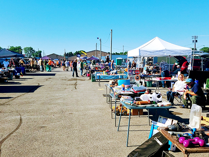 Organized rows of vendors stretch endlessly, proving that good deals come to those who walk.