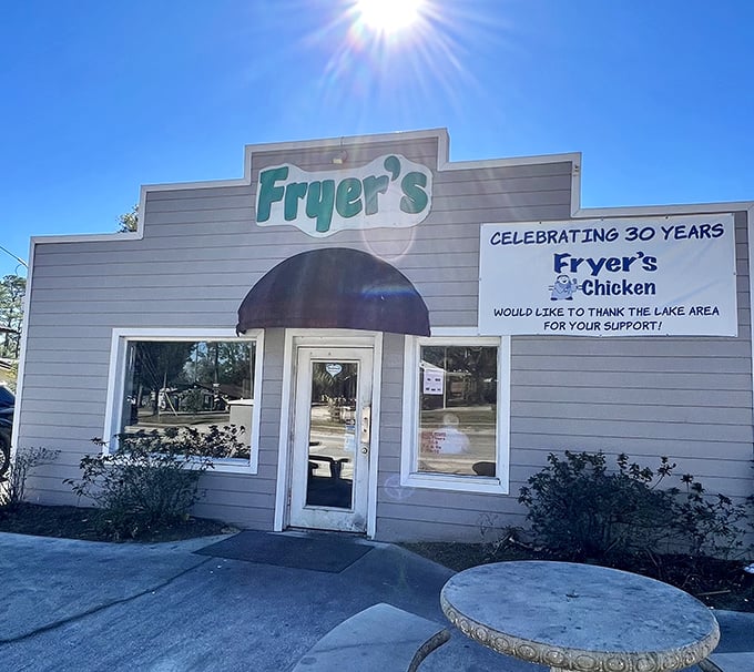 This humble gray storefront holds decades of crispy secrets that locals guard like family recipes.