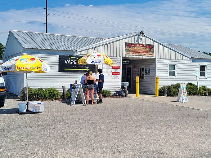 White buildings, blue skies, and endless possibilities. Hudson's Surfside Flea Market offers a quintessential coastal shopping experience.