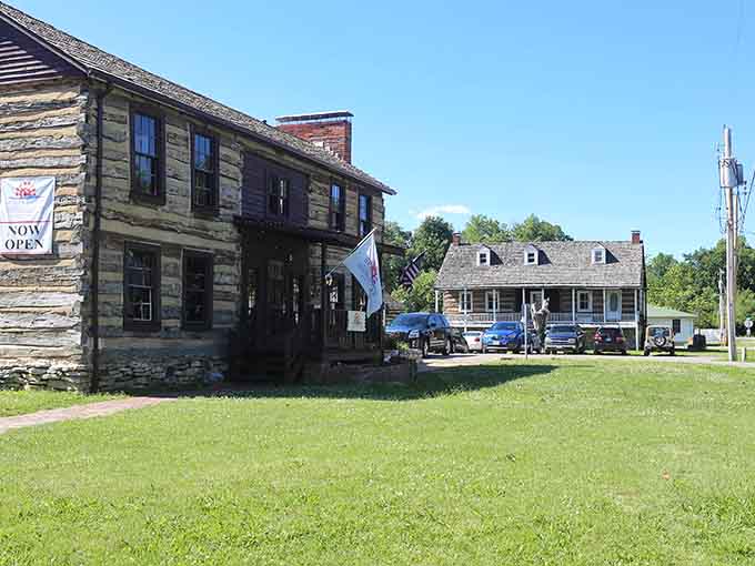 Rustic log cabins and wide green spaces invite your inner adventurer to discover Kimmswick under a beautiful, sunny sky.