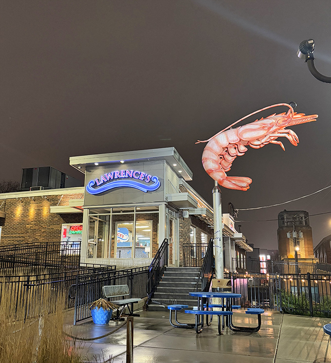 By day or night, that glowing shrimp sign promises seafood salvation for the hungry souls of Chicago.